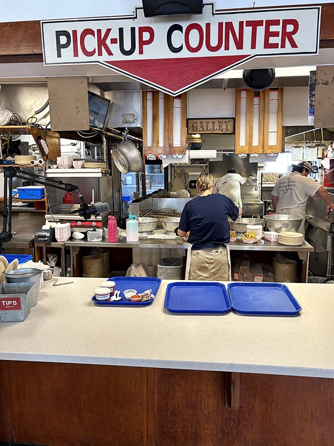 Where the magic happens. The pick-up counter at Woodman's operates with the precision of a symphony and the heart of a family kitchen.