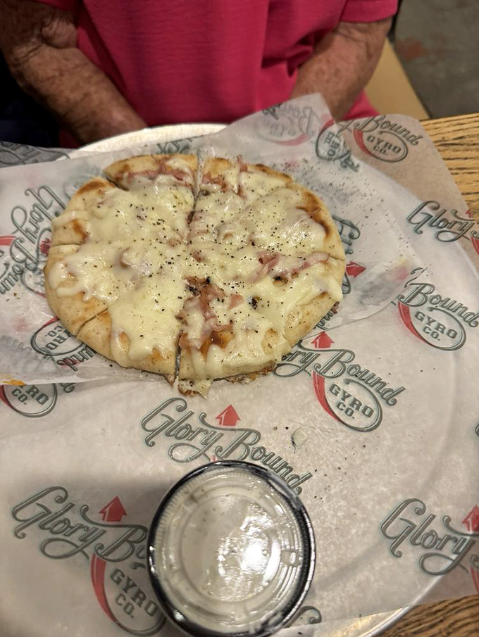 This pita pizza is what happens when you let Mediterranean and Italian cuisines share an apartment&mdash;they start borrowing each other's best ideas.