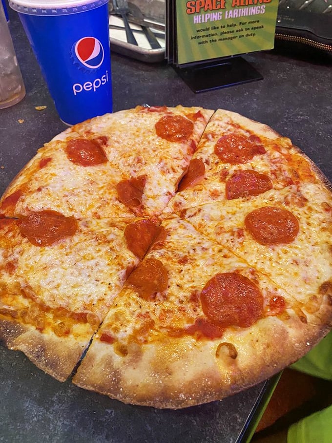 A pepperoni pizza so perfectly circular it could be mistaken for a newly discovered planet. Each slice is a sector worth exploring.