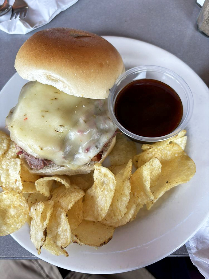 The burger that launched a thousand napkins. That melted cheese blanket isn't just delicious&mdash;it's practically therapeutic after a long morning.