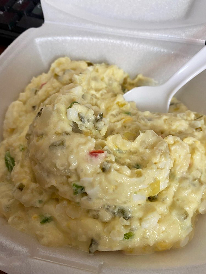 This potato salad has secrets. Not the kind you whisper, but the kind you taste and spend years trying to replicate.