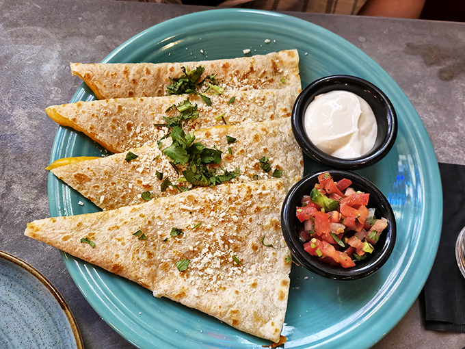 Quesadillas: the unsung heroes of Mexican menus. These golden triangles with their perfect char marks deserve their own spotlight.