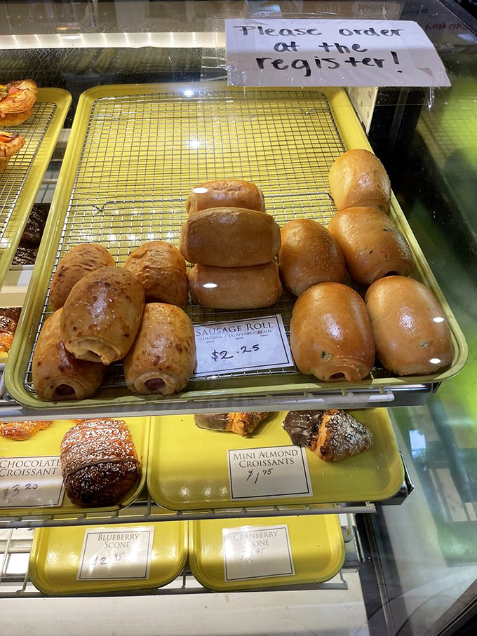 Sausage rolls standing at attention, golden-brown and ready for duty. These savory soldiers will fight hunger with delicious determination.