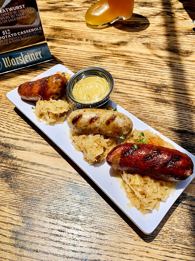 The sausage sampler that settles debates. Three distinct personalities sharing one plate, proving variety truly is the spice of life.