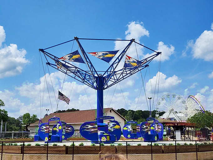 The Screaming Eagles ride combines patriotism with gravitational adventure, giving riders a bird's-eye view of the park between moments of gleeful vertigo.