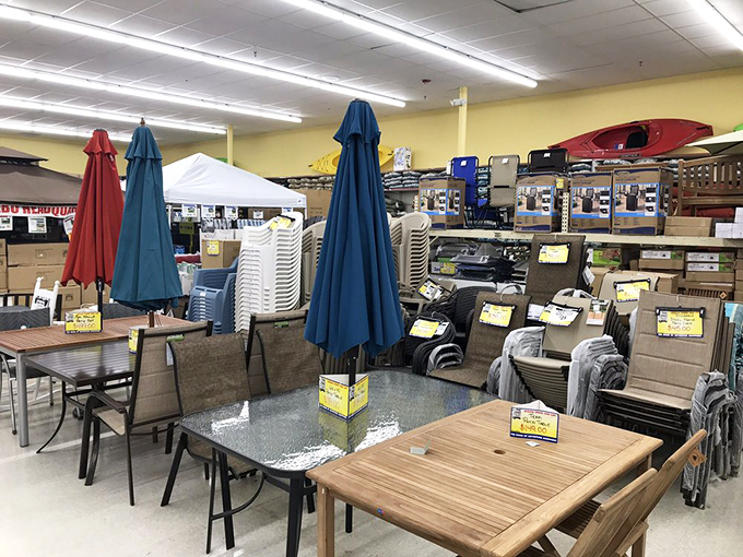 Patio furniture that whispers of summer barbecues and lazy afternoons &ndash; all arranged in a display that makes winter seem temporary.