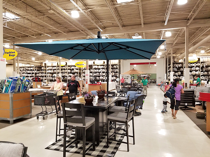 Serious shoppers on the hunt, measuring tape in hand, ready to make decisions that will transform their living spaces.