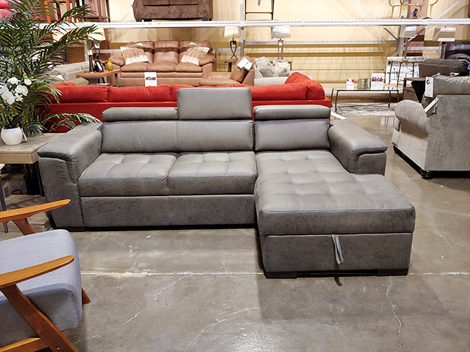 That gray sectional with studded details isn't just a sofa &ndash; it's the future center of family movie nights and impromptu naps.