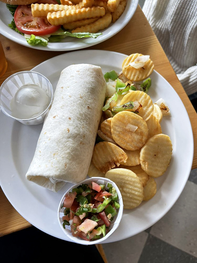 The burrito-and-chips combo that launched a thousand food comas, with house-made pico de gallo adding just enough virtue to justify the indulgence.