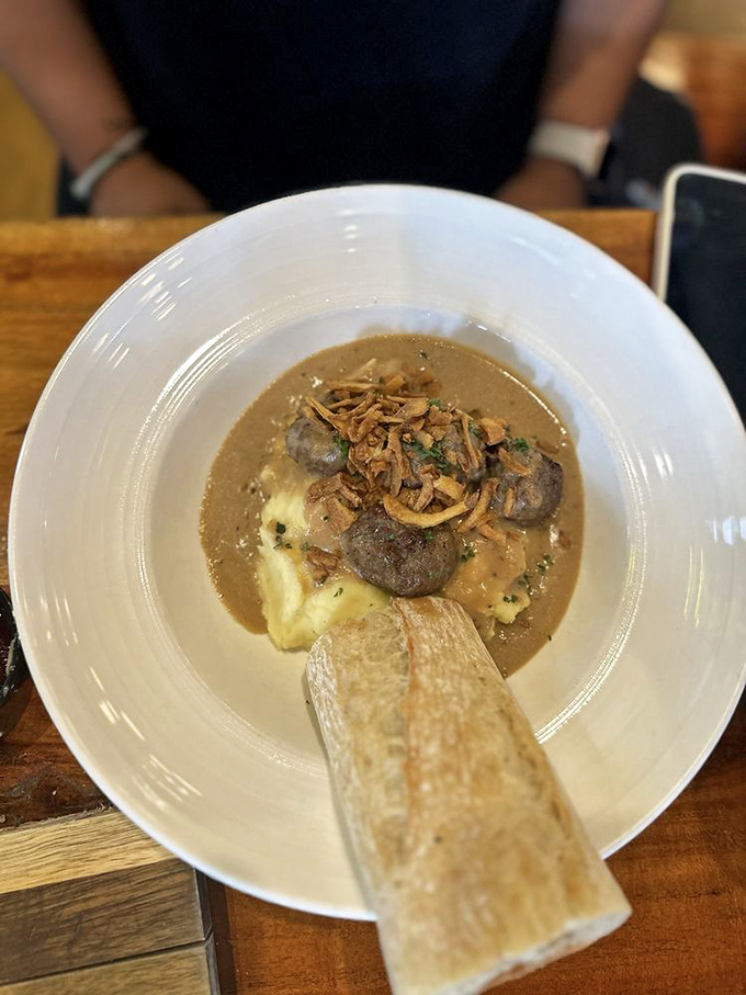 These meatballs aren't just swimming in gravy &ndash; they're doing the backstroke in a pool of comfort that makes you want to dive right in.