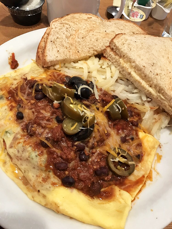 This isn't just an omelet&mdash;it's a Tex-Mex fiesta where eggs invited jalape&ntilde;os, black beans, and cheese to party under a blanket of chili.