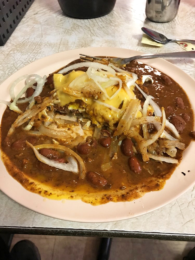 The legendary Slinger: where chili, eggs, and onions come together like a breakfast symphony conducted by someone who truly understands hunger.