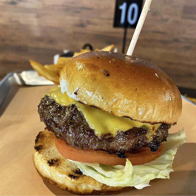 This Wagyu burger isn't just dinner&mdash;it's an event. The brioche bun, melted cheese, and perfect char create a symphony of flavors worth every calorie. 