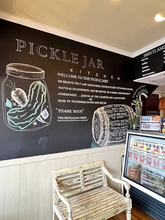 The chalkboard wall serves as both menu and manifesto, illustrating Pickle Jar's commitment to wholesome ingredients and homestyle cooking.