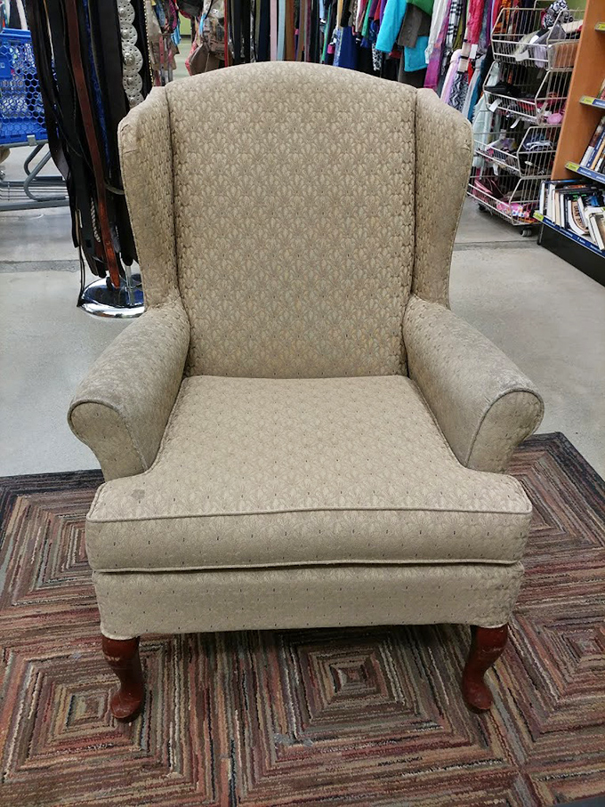 This wingback chair has seen things. Probably hosted conversations about moon landings, Watergate, and what's for dinner.