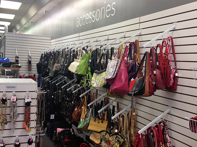 Handbag heaven or purse purgatory? Your choice of leather, pleather, and fabric companions hang in suspended animation, waiting for the right shoulder to come along.