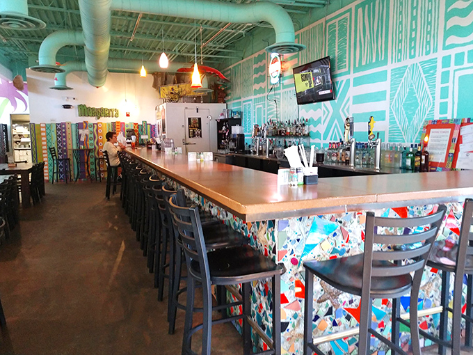 The bar doesn't just serve drinks&mdash;it serves escapes. That colorful mosaic front panel contains at least seven conversation starters and three future friendships.