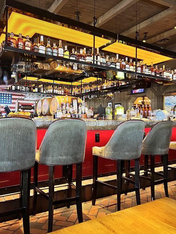 The bar isn't just stocked&mdash;it's a bourbon library with enough amber options to make a whiskey lover plan weekly visits.