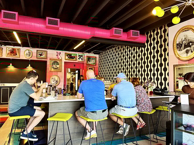 Counter culture at its finest—lime green stools invite you to perch and watch breakfast theater unfold. Front-row seats to culinary magic.