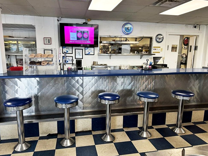 Counter seats: the front-row tickets to culinary theater. These blue vinyl stools have supported generations of hungry Mississippians and travelers alike.