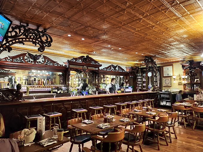 Behind this magnificent bar, bottles gleam like treasures and pints are poured with the reverence they deserve.