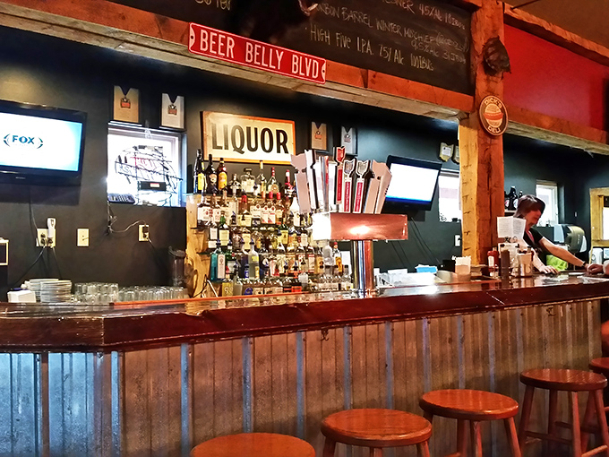 "Beer Belly Blvd" marks the spot where liquid happiness flows from taps and bottles line up like soldiers ready for duty.