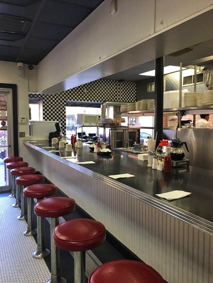 The counter seats aren't just stools; they're front-row tickets to the greatest show in Boston&mdash;breakfast theater with spatula-wielding maestros.