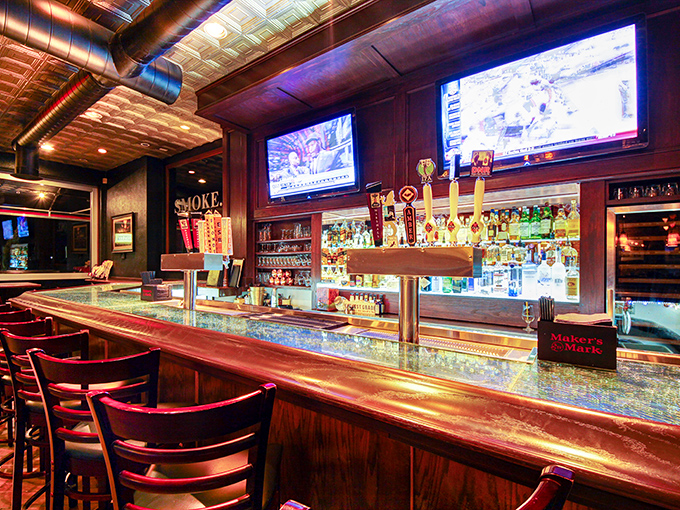 The bar at SMOKE. isn't just where drinks are made – it's command central for an evening of sophisticated indulgence and spirited conversation.