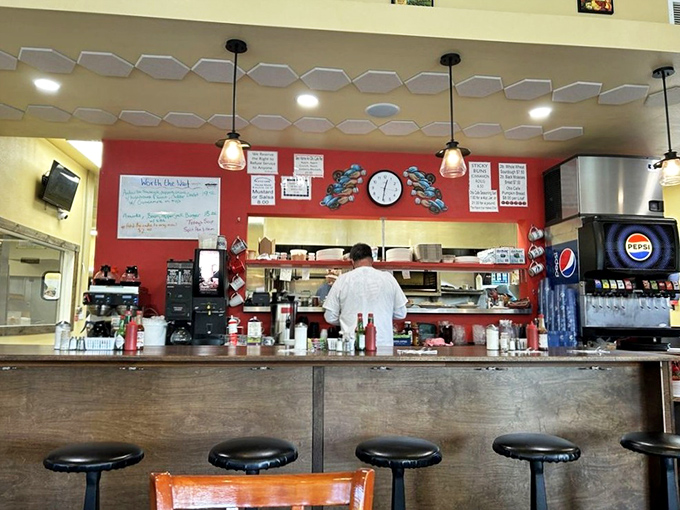 The open kitchen design isn't about trendy restaurant concepts&mdash;it's about trust, transparency, and watching breakfast magic happen in real time. 