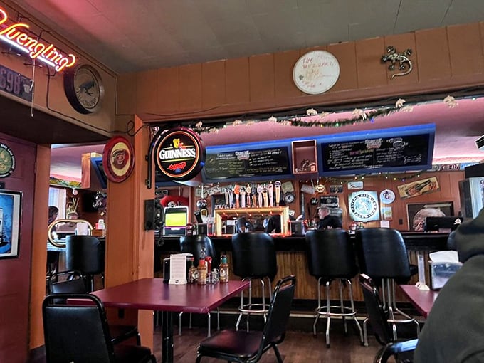 Bar stools that have supported countless elbows and stories. The Guinness sign glows like a lighthouse for the thirsty.