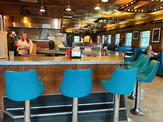 The counter service area&mdash;where barbecue dreams become reality. Those turquoise stools have supported three generations of happy customers.