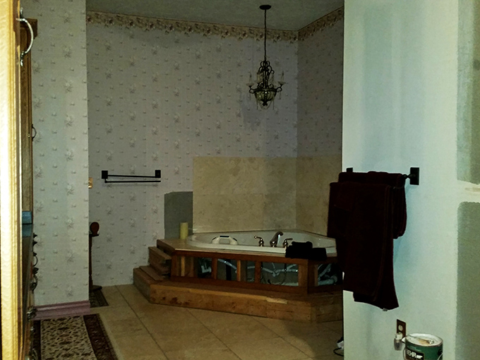 Even castle bathrooms can be luxurious&mdash;this corner tub invites weary travelers to soak away the desert dust after a day of Nevada exploration.