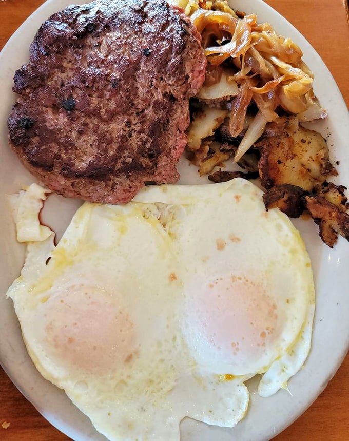 The breakfast of champions &ndash; a juicy hamburger steak, farm-fresh eggs, and potatoes that have been on a first-name basis with butter and onions.