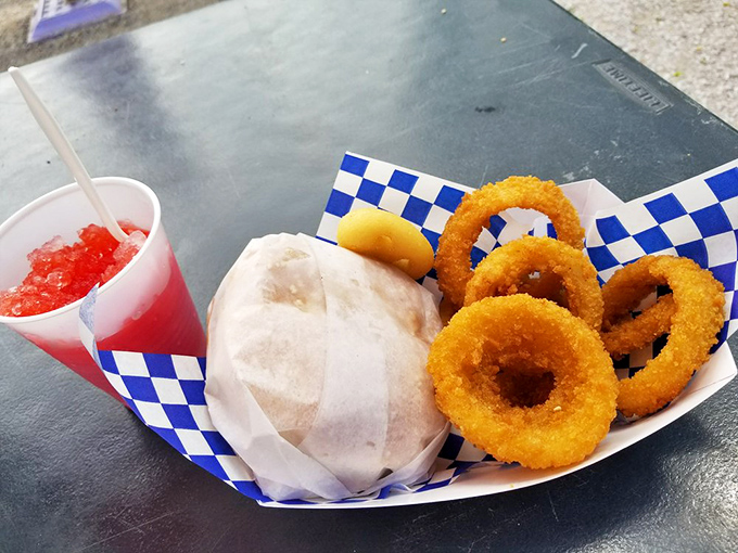 The perfect road trip combo&mdash;a classic burger and golden onion rings with a side of Route 66 nostalgia.
