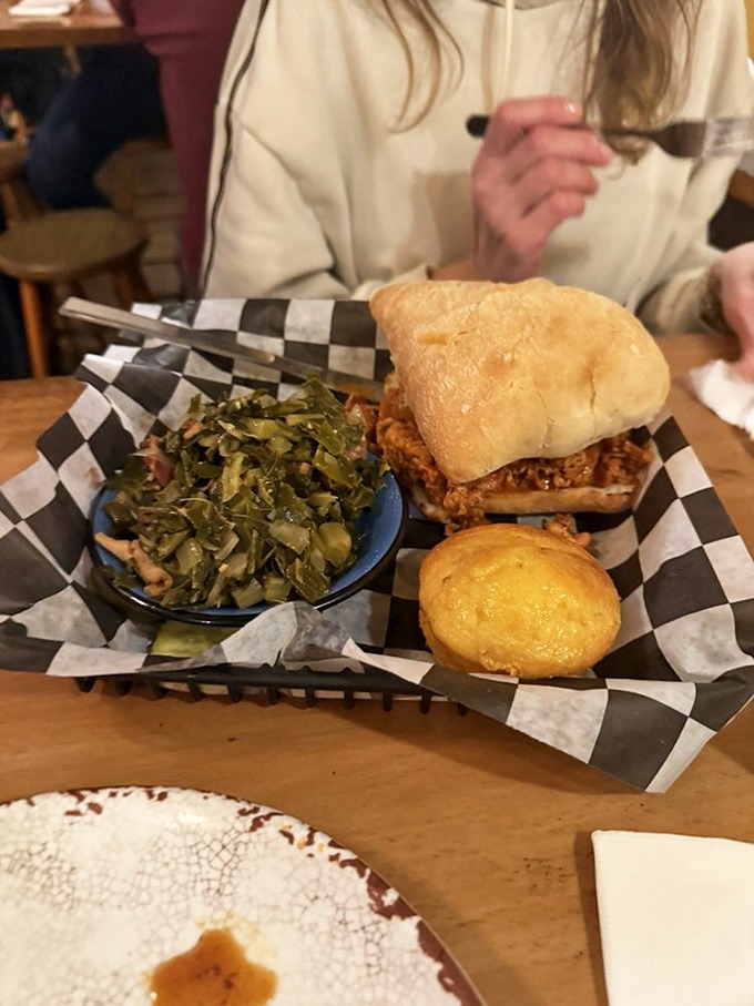 A sandwich that demands two hands and your full attention. Those collard greens aren't just healthy&mdash;they're an essential counterpoint.