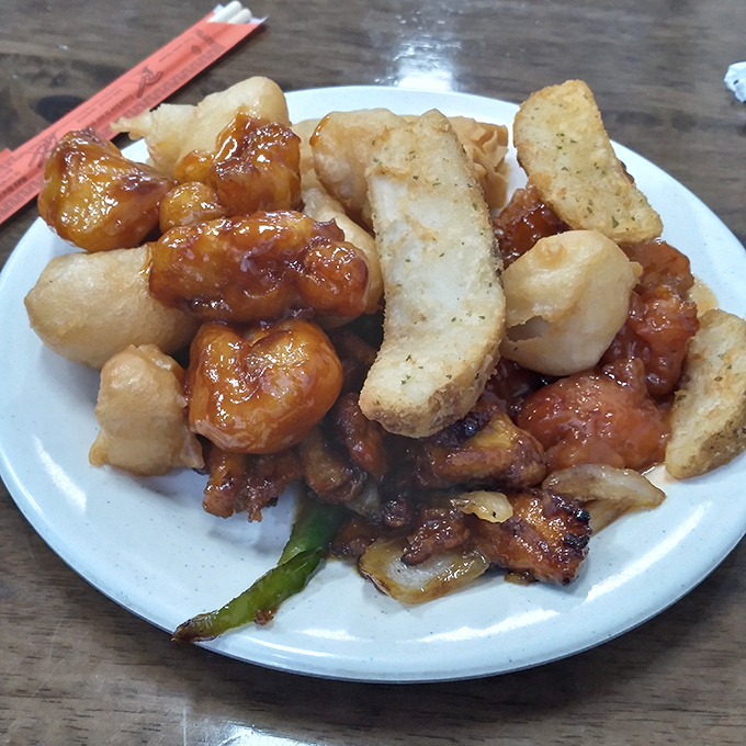 Sweet meets savory in this plate where the sauce glistens with such promise you'll be planning your next visit before finishing this one.