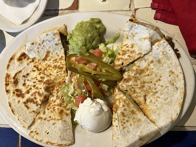 A quesadilla that understands the perfect cheese-to-tortilla ratio is as important as the air we breathe. Simple perfection with all the right accessories.