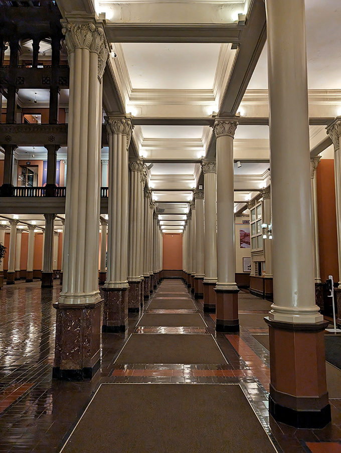A colonnade of perfectly aligned pillars creates a perspective that would make Renaissance artists weep with geometric joy.