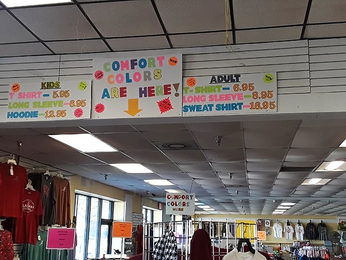 Handmade signs announce "COMFORT COLORS ARE HERE!" with the enthusiasm usually reserved for royal proclamations or circus arrivals.