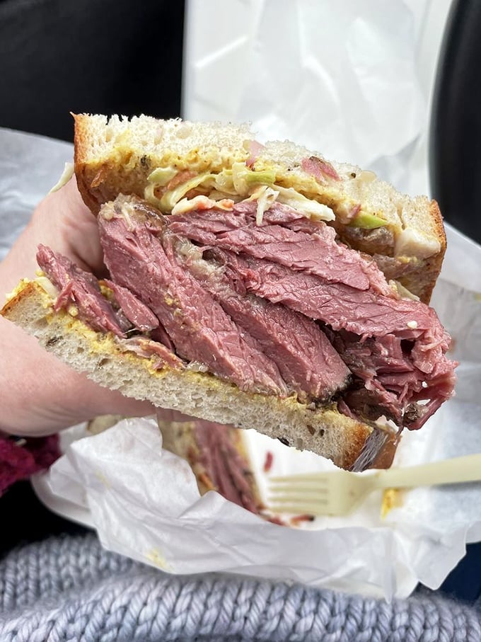 This isn't just a sandwich; it's an engineering marvel where properly cured meat becomes the star of a hand-held flavor explosion.
