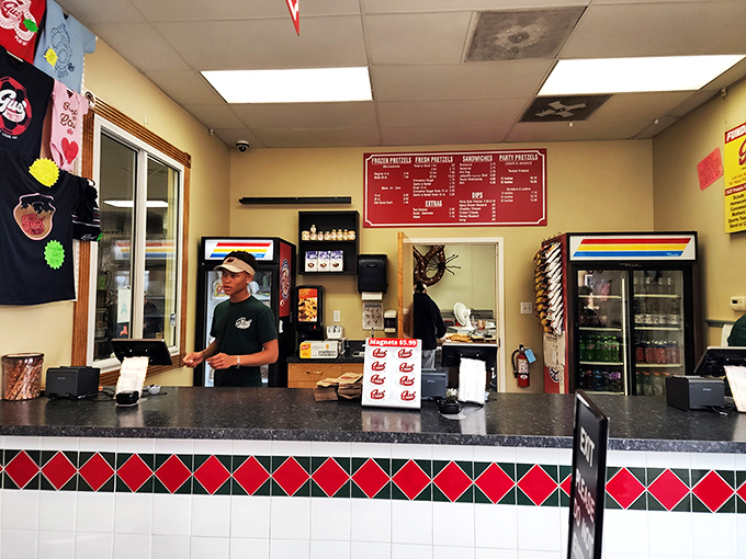 Behind this counter, pretzel magic happens with the precision of a Swiss watch and the soul of a St. Louis blues musician.