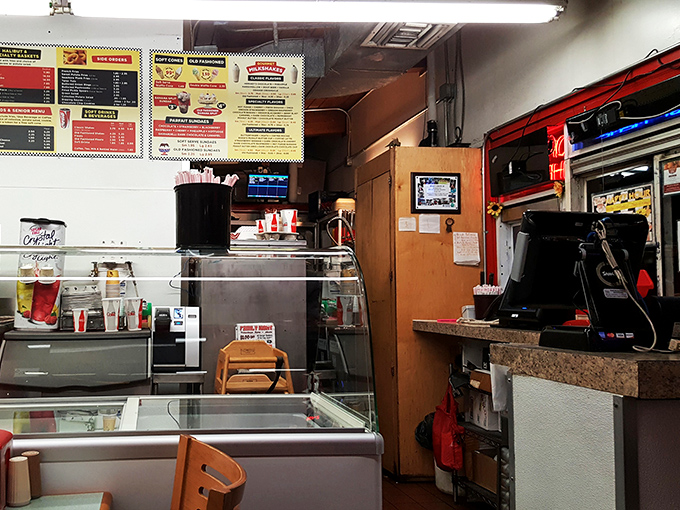 Behind this counter, burger magic happens with the efficiency of a NASCAR pit crew and the care of a craftsman. 