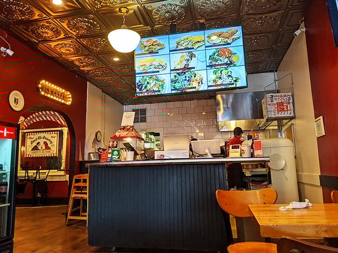 Behind this counter, ice cream dreams come true. Digital menu boards showcase creations that would make your childhood self high-five your adult self.