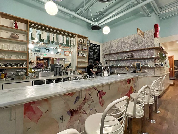 Marble countertop, vintage-inspired stools, and endless possibilities. The soda fountain counter—where decisions matter and calories don't.