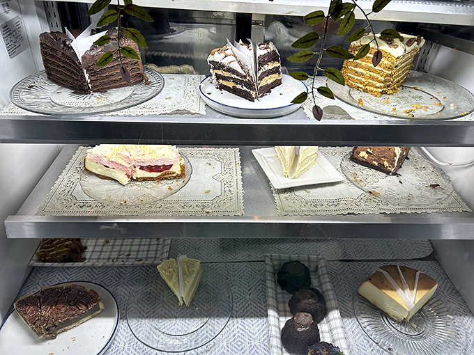 The dessert case flaunts temptations that would make your dietitian weep &ndash; each slice promising that calories consumed with joy don't count.