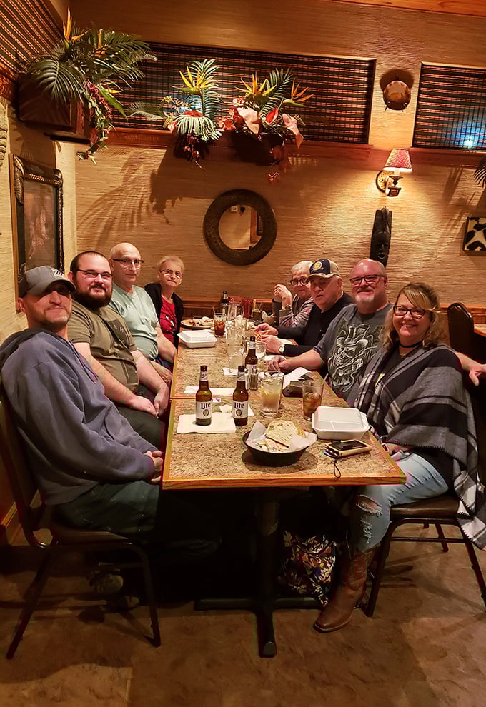 The true measure of a great restaurant: tables filled with people who look like they've just discovered the secret to happiness. Spoiler alert: it's ribs.