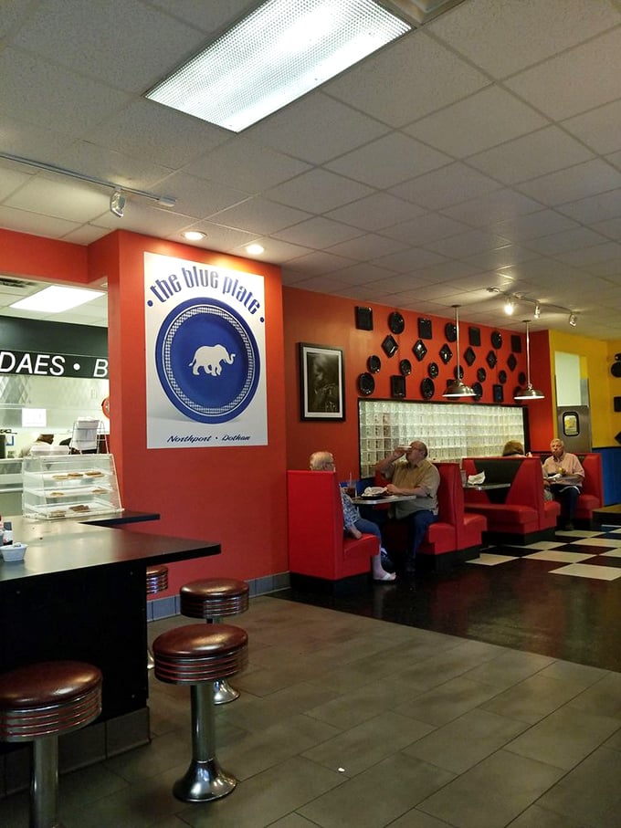 The legendary elephant logo watches over diners in this vibrant space. Red booths beckon you to sink in and stay awhile.