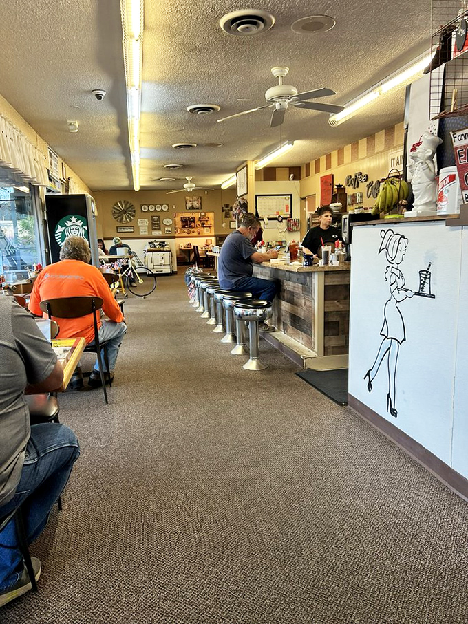 The counter seats&mdash;where breakfast philosophers gather to solve the world's problems over eggs and endless coffee refills.