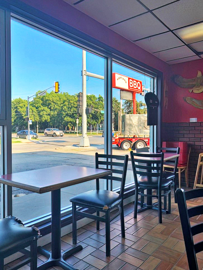 The view from your table includes both the street outside and the important knowledge that a smoker full of meat is nearby.