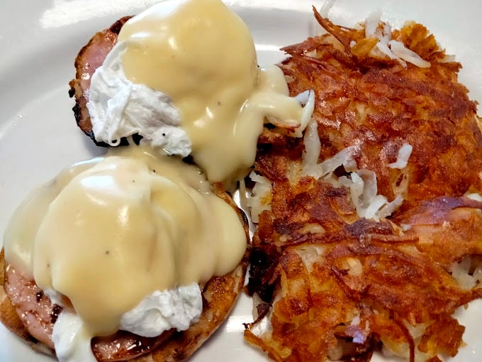 Eggs Benedict: where hollandaise becomes a silky blanket tucking in perfectly poached eggs. Those hash browns are the crispy bedmates you didn't know you needed.